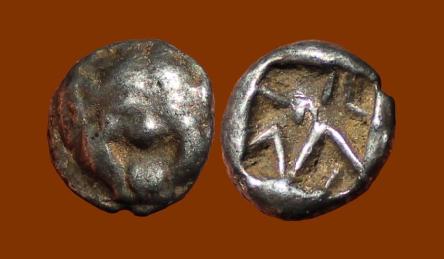 a scary Gorgoneion | Coin Talk